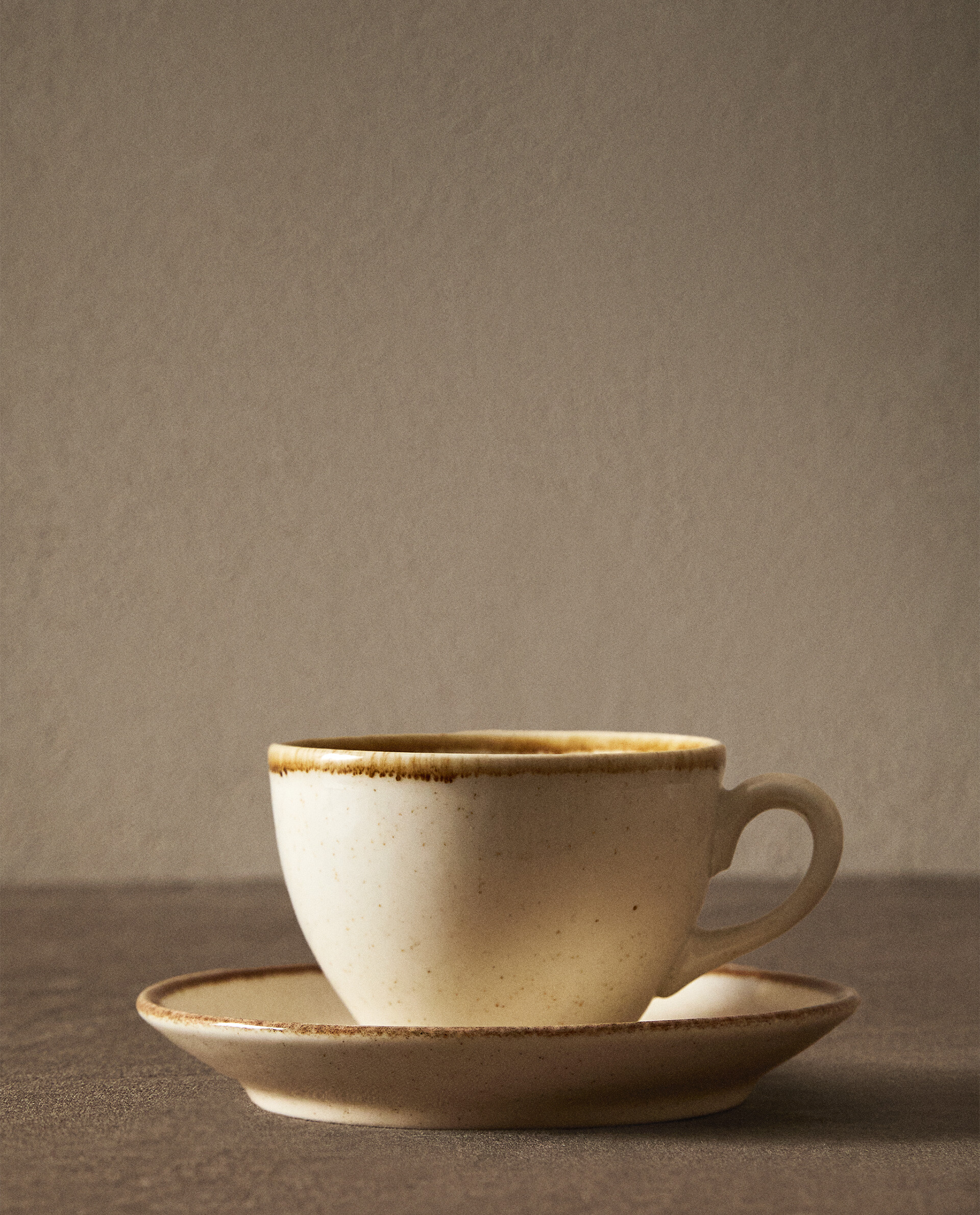 PORCELAIN TEACUP WITH ANTIQUE FINISH RIM | Zara Home Saudi Arabia
