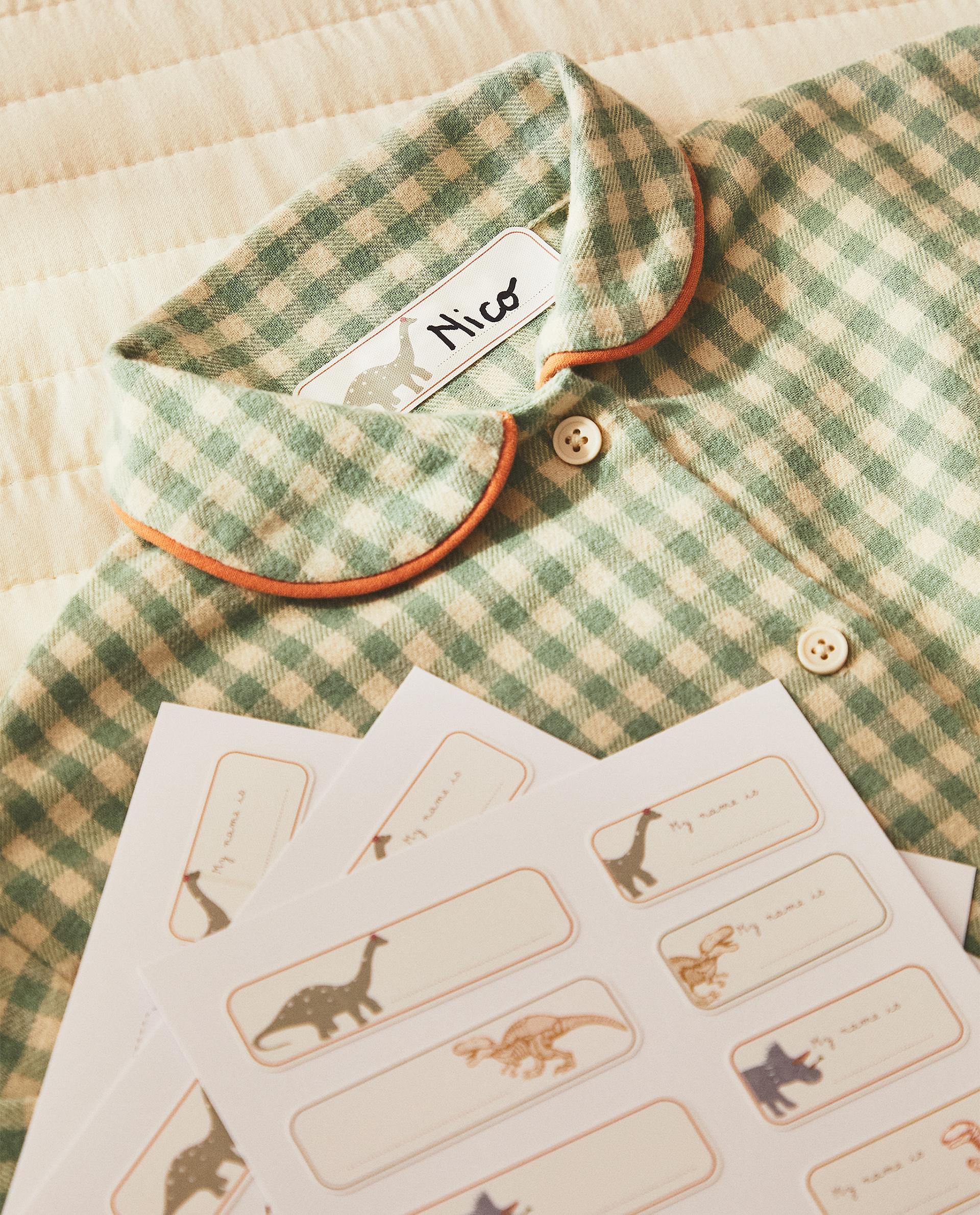 Thermo-adhesive clothing labels Dinosaurs | Zara Home UAE - ABU DHABI ...