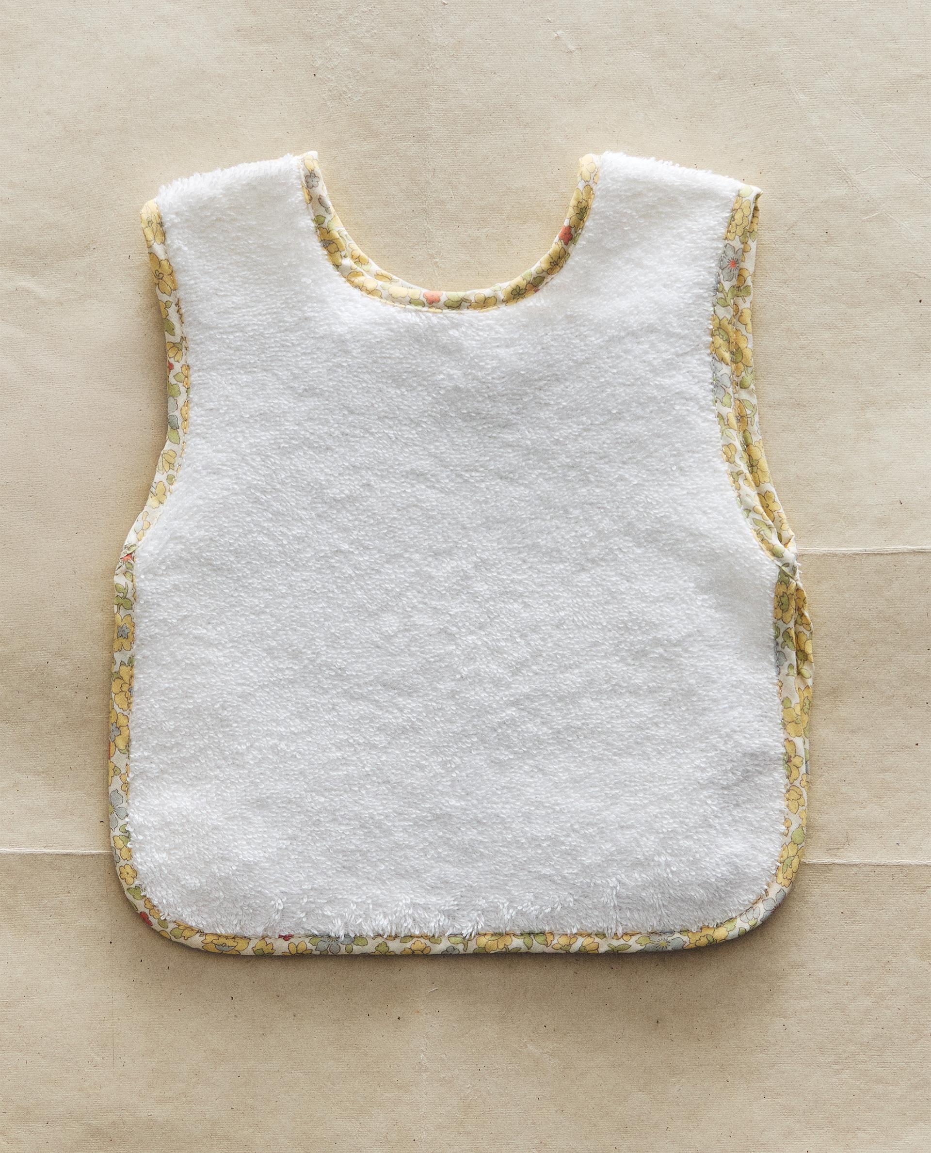 BABERO INFANTIL PIPING FLOR | Zara Home Colombia